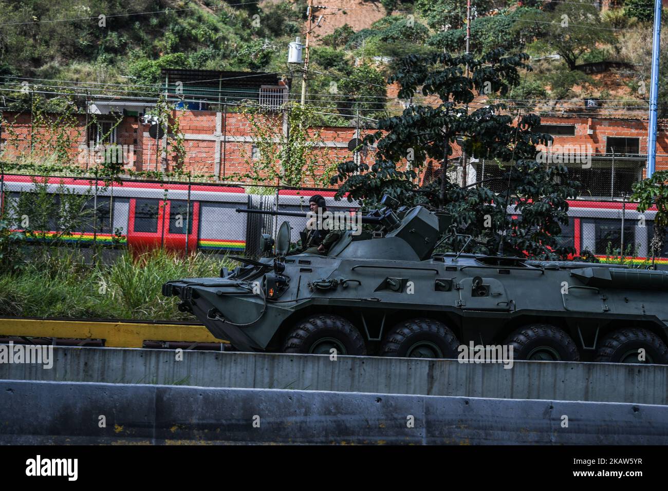 An armoured tank from the Venezuelan army drives along a highway in ...