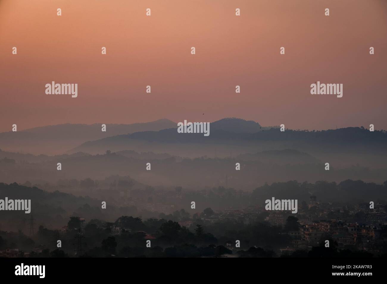 A cityscape view of Hamirpur, Himachal Pradesh with hills at sunset in ...