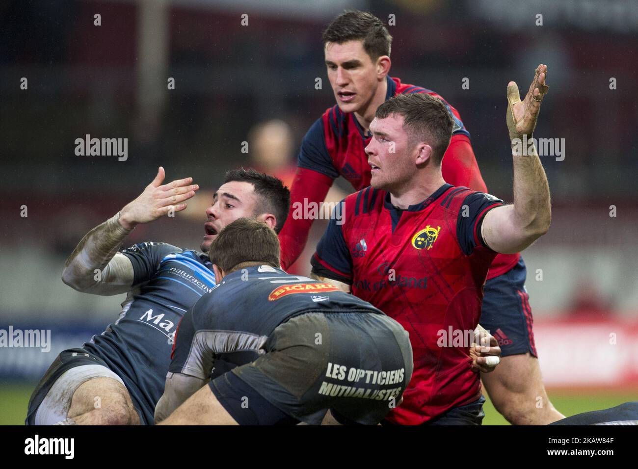Geoffrey Palis of Castres and Peter O'Mahony of Munster react to the ...
