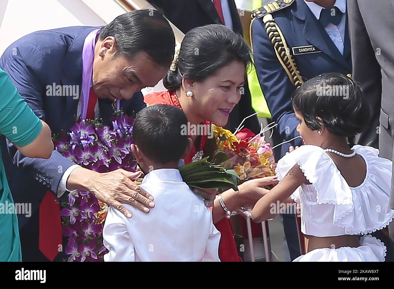 Indonesian President Joko Widodo and his wife Iriana Joko Widodo are ...