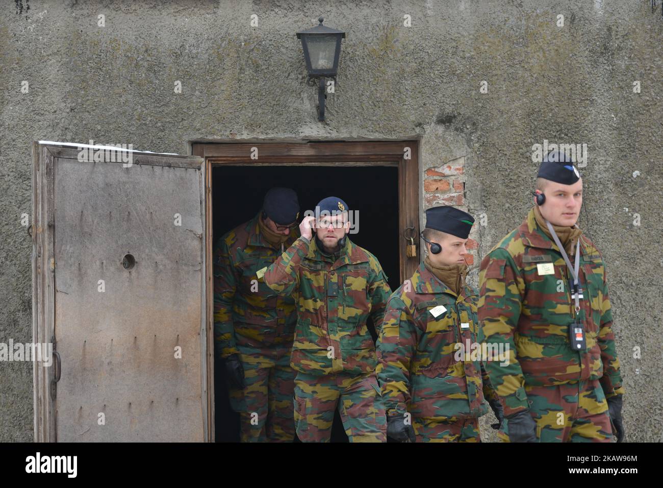 A group of Belgian soldiers leave the gas chamber building during their ...