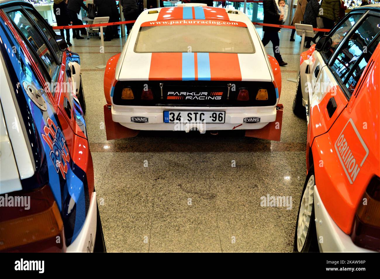 Racing automobiles are seen as retro cars, gears and equipments used by ...