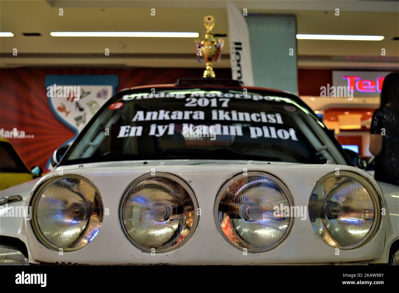 A racing automobile is seen as retro cars, gears and equipments used by ...