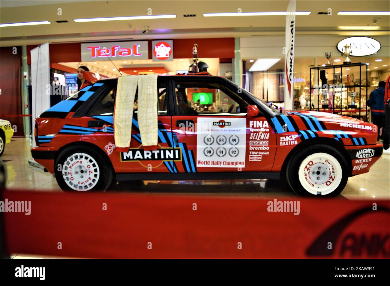 A racing automobile is seen as retro cars, gears and equipments used by ...