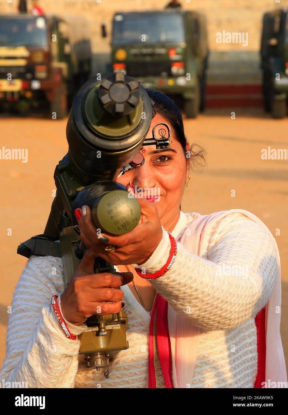 An Indian army Jawans share information about weapons with local ...