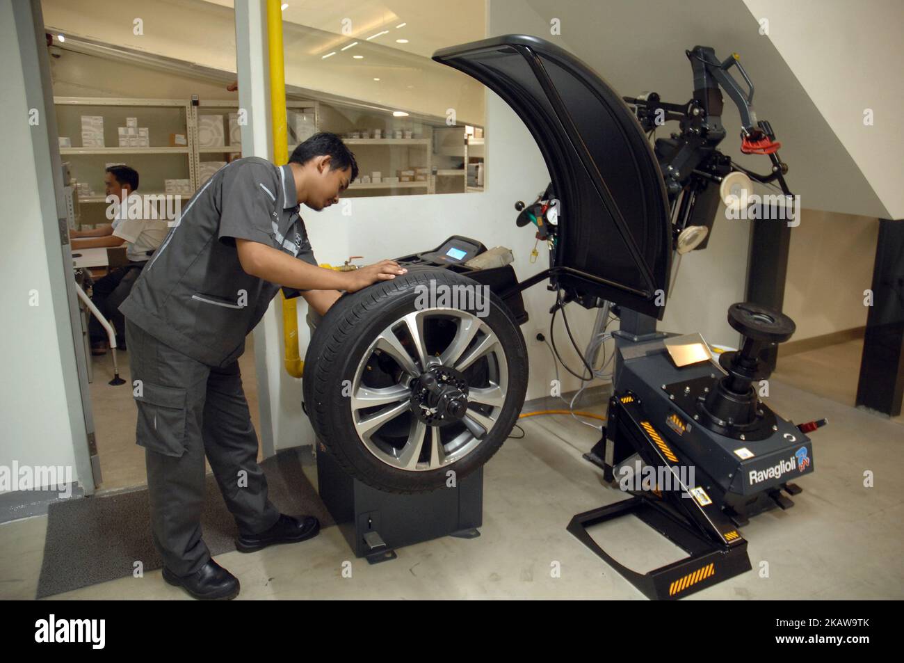 JAKARTA, INDONESIA, JAN-25: Technicians repair service vehicles and ...