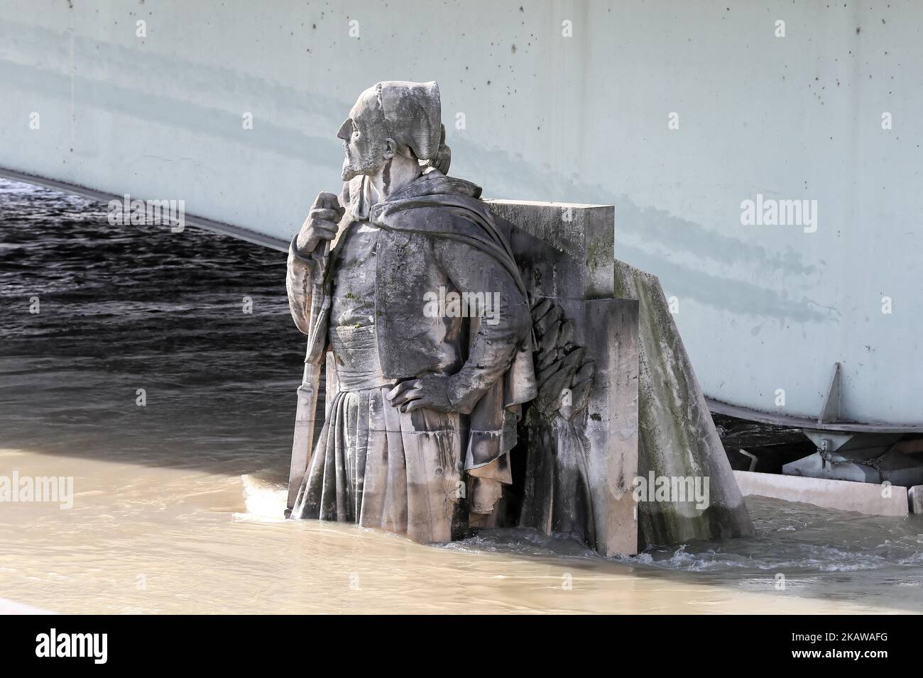 The Zouave statue at the Pont D'Alma bridge stands partially submerged ...