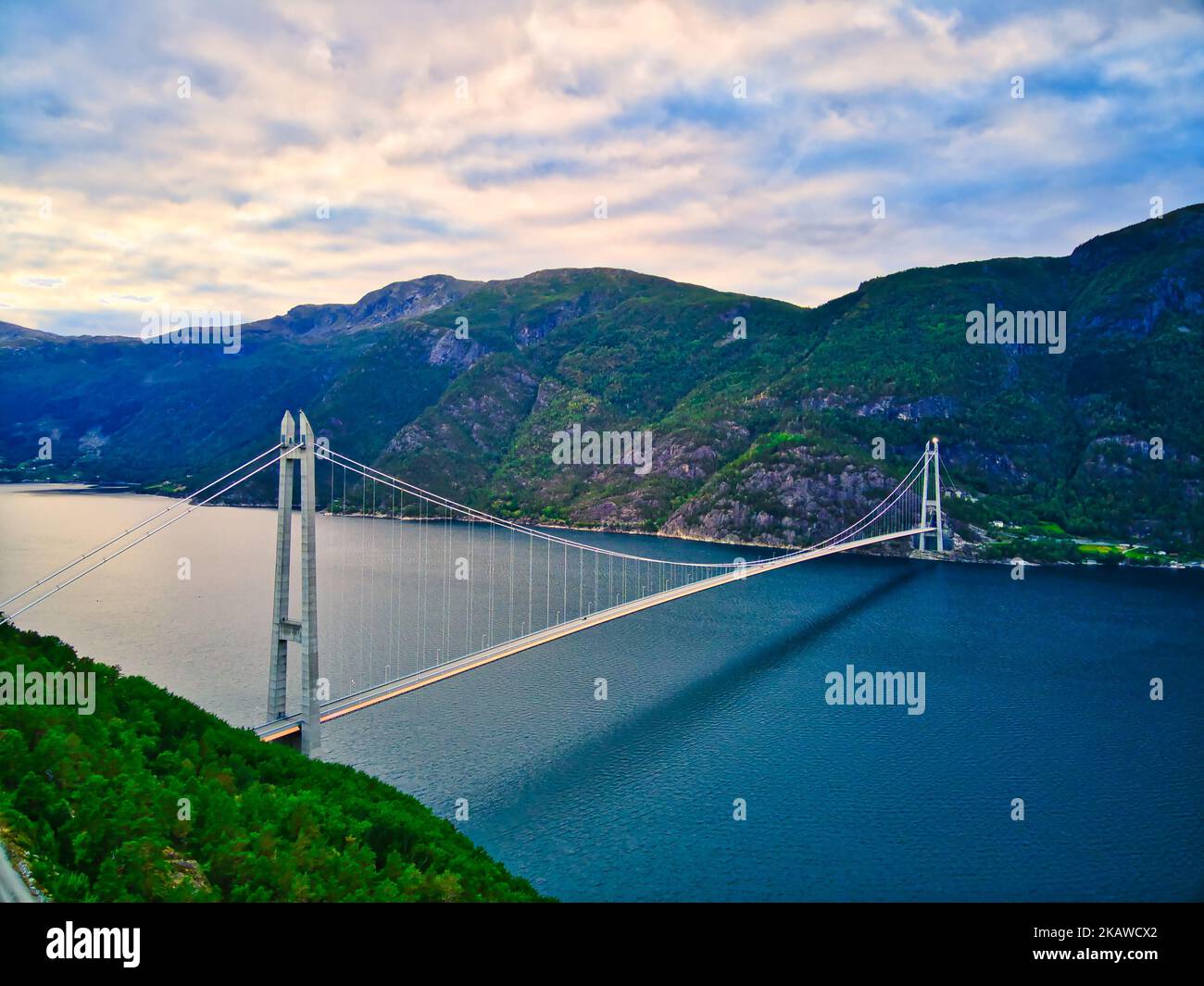 A beautiful scenery of a landscape with a huge bridge in Norway in ...