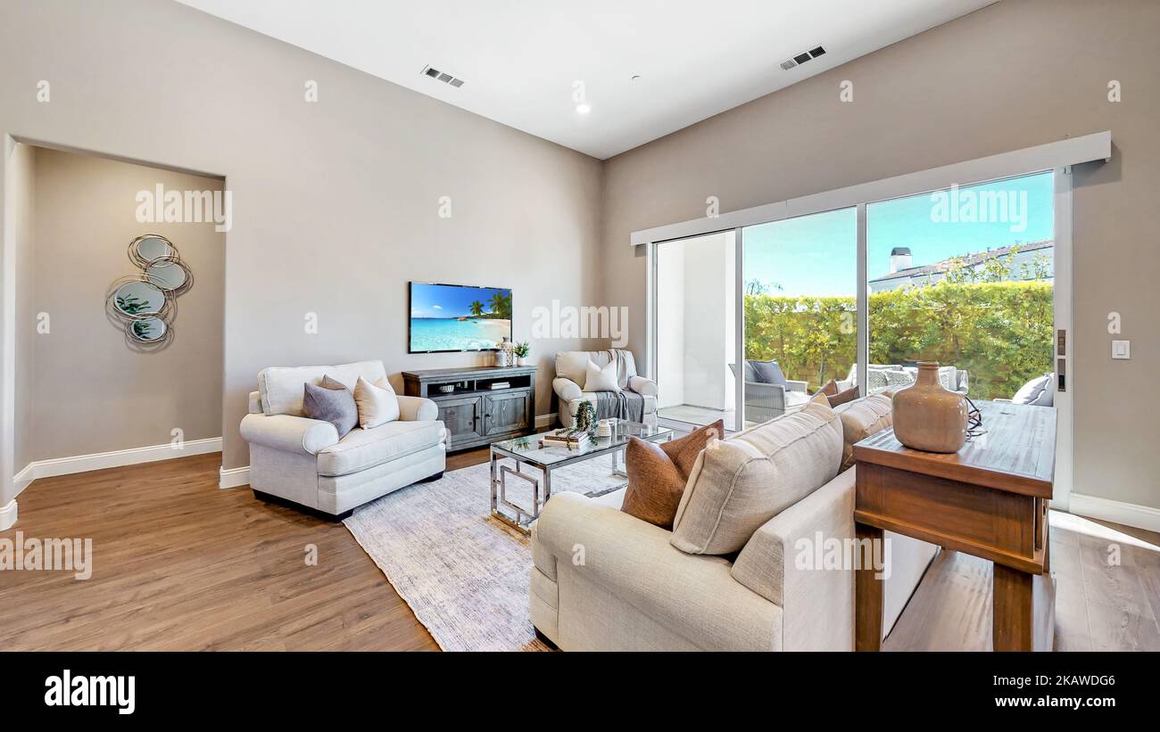 A luxury design of living room with white sofas, Glass Sliding Door ...