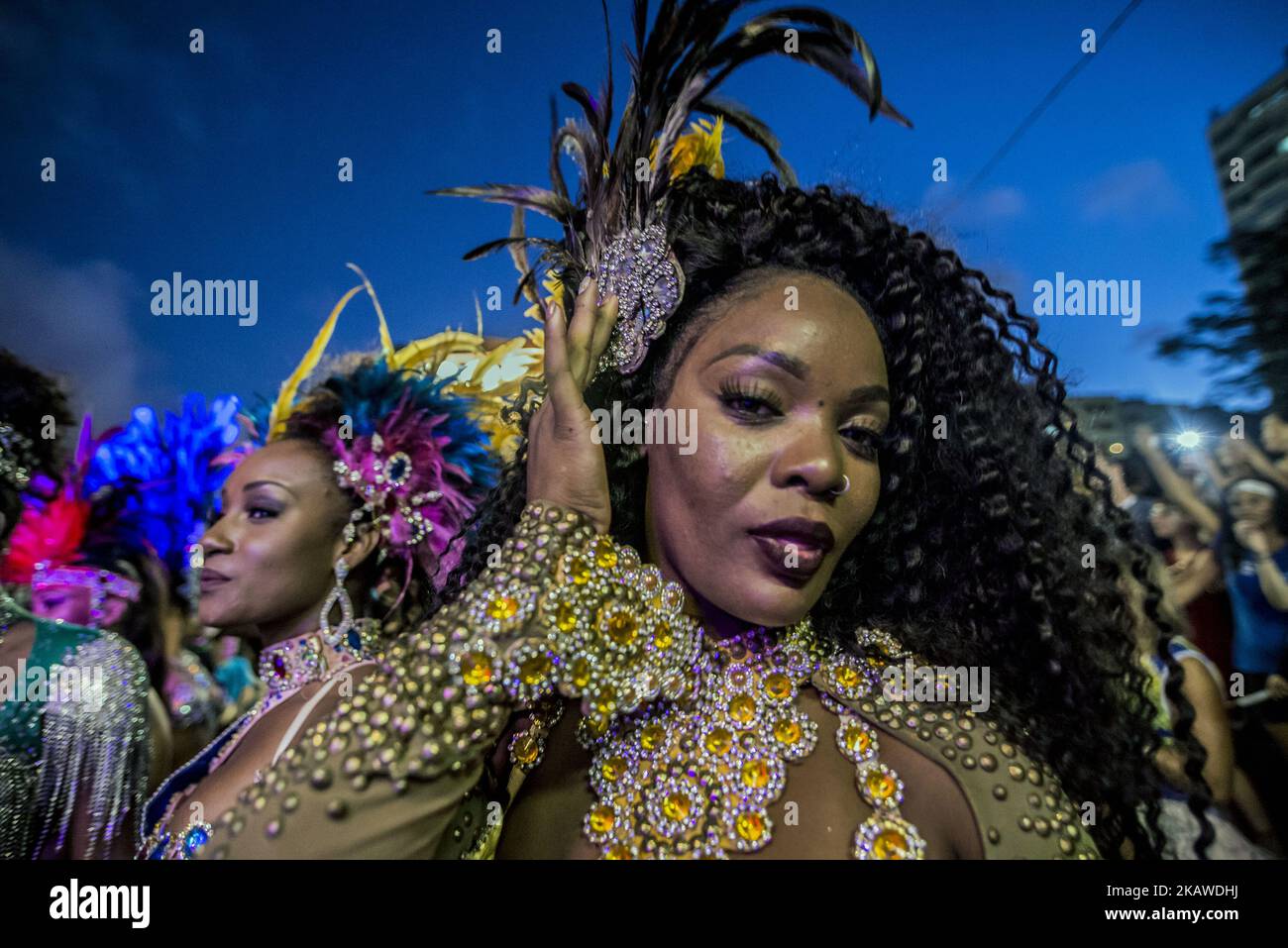 Revelers pose during Carnival celebrations at the Street Carnival in ...