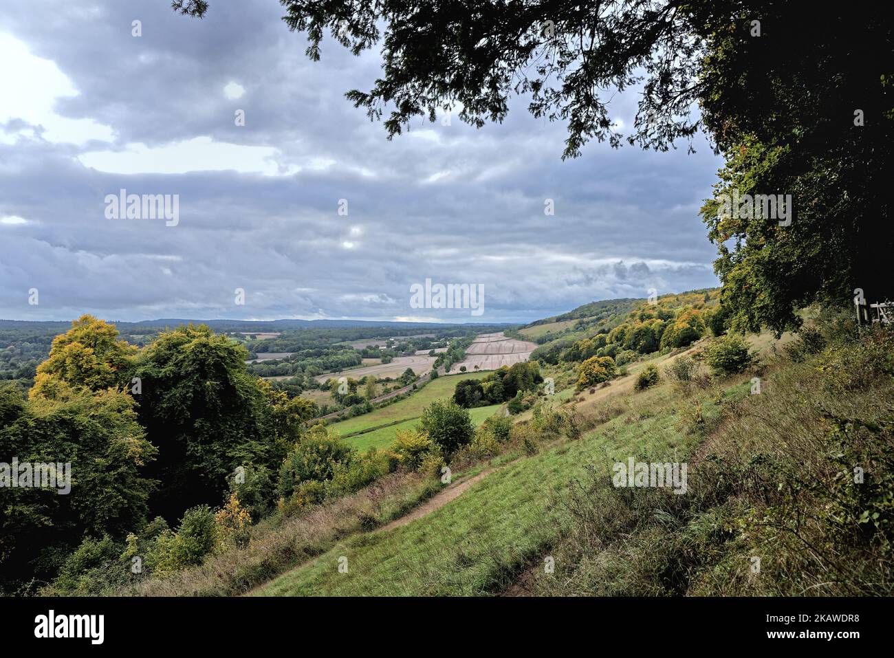 The Surrey Hills at Ranmore Common with dark clouds forming on an ...