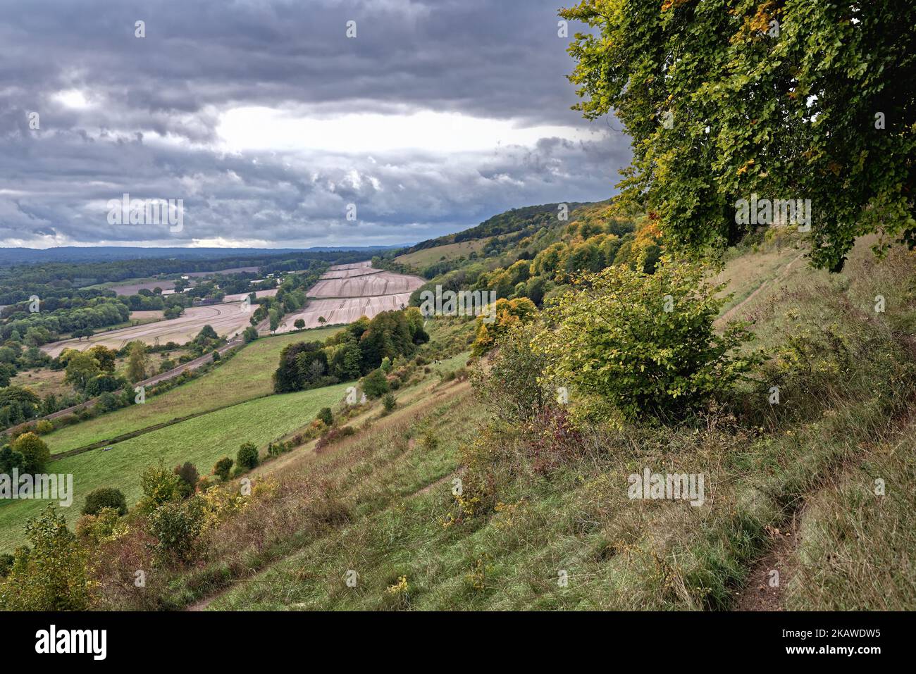 The Surrey Hills at Ranmore Common with dark clouds forming on an ...