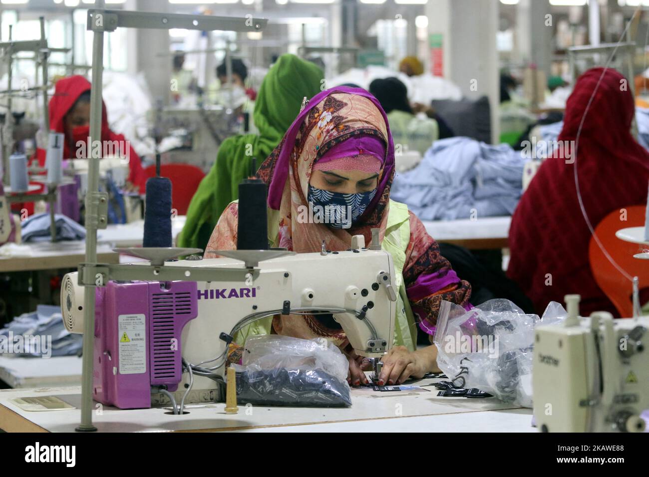 Dhaka, Bangladesh,On November 02, 2022. Bangladeshi worker works at a ...