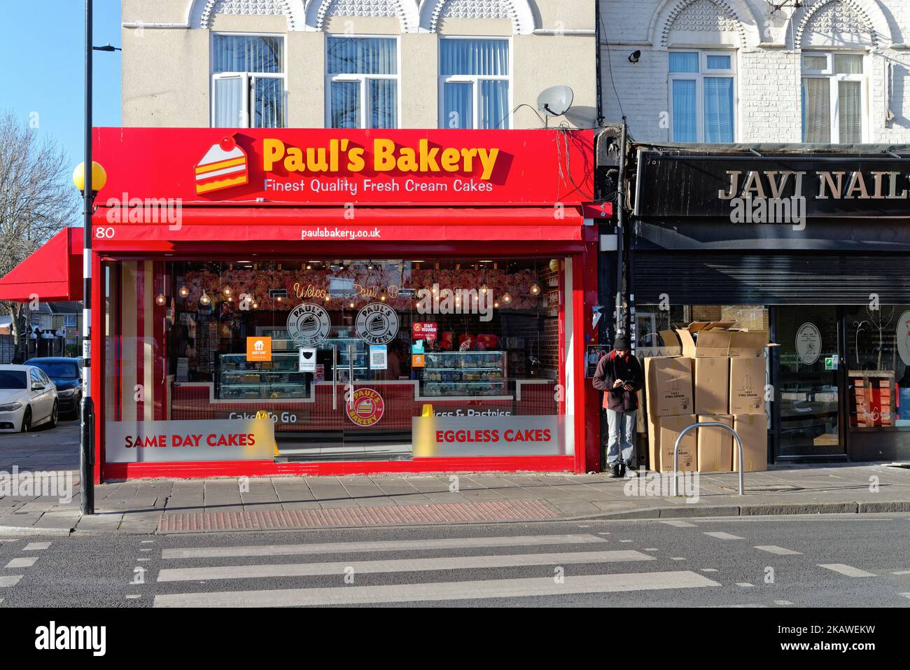 Colourful multicultural shop fronts in Southall Greater London England ...