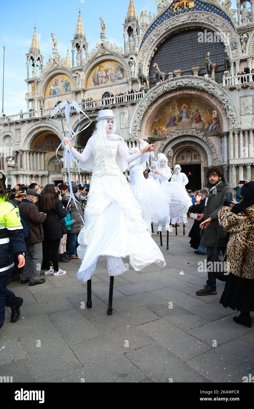 People wearing costumes attend the traditional events of Carnival ...