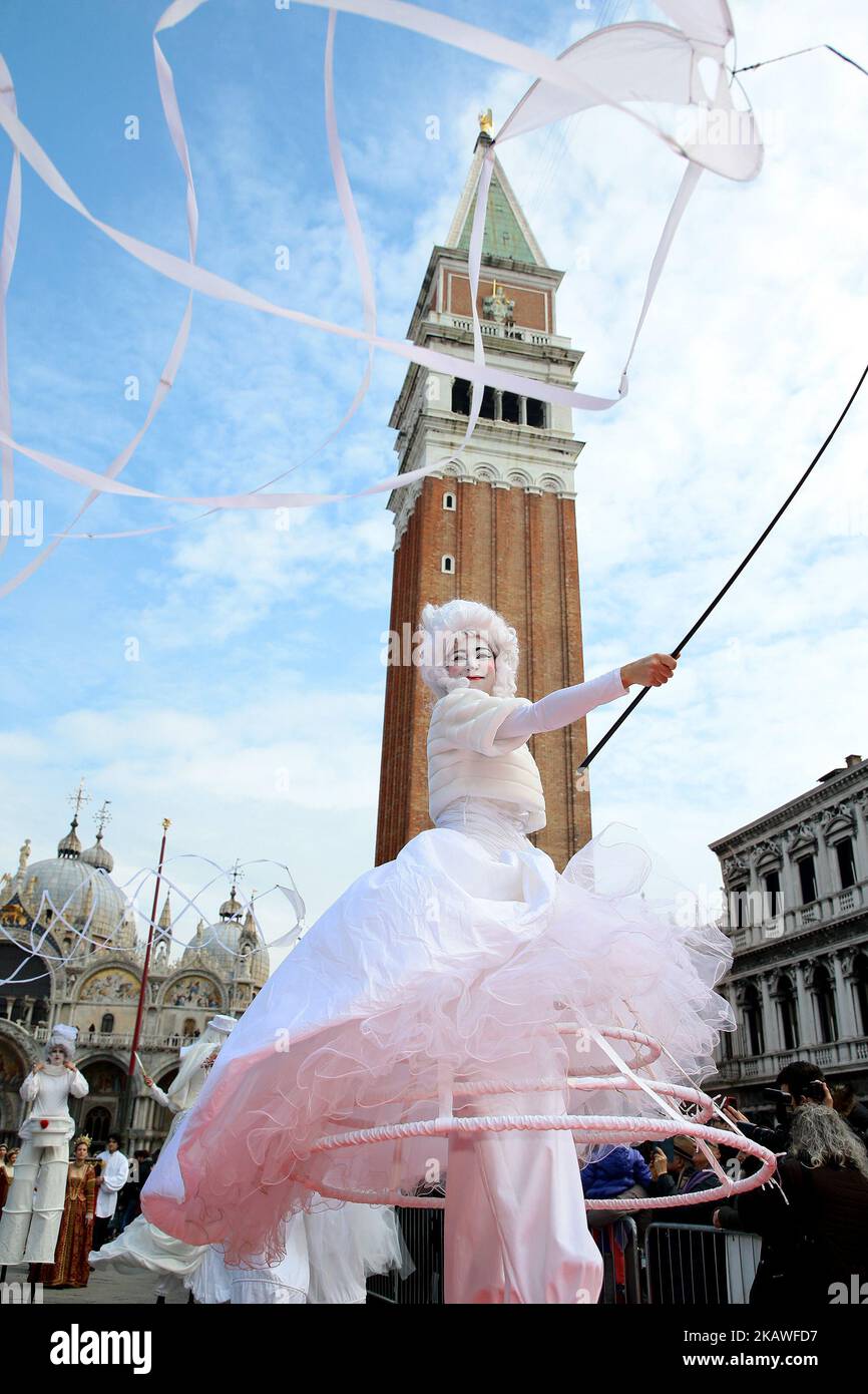 People wearing costumes attend the traditional events of Carnival ...