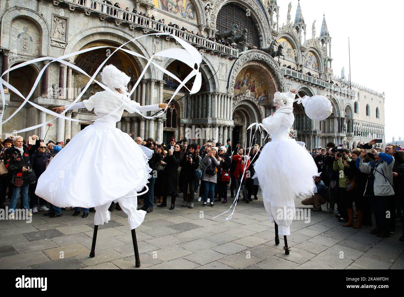 People wearing costumes attend the traditional events of Carnival ...