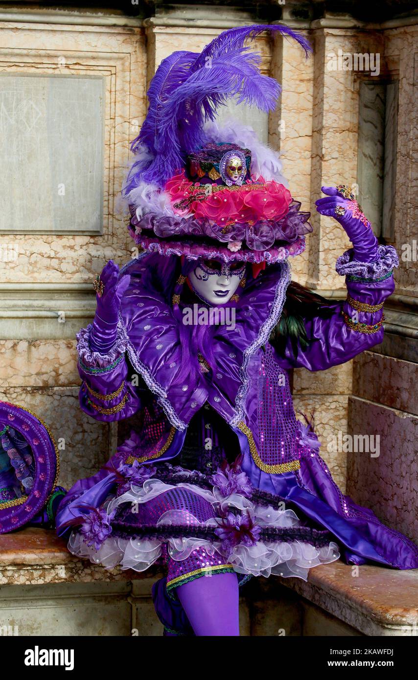 People wearing costumes attend the traditional events of Carnival ...