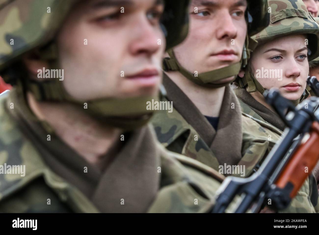 Female cadet in uniform with AKMS 7,62 x 39 mm assault rifles (AK-47 ...