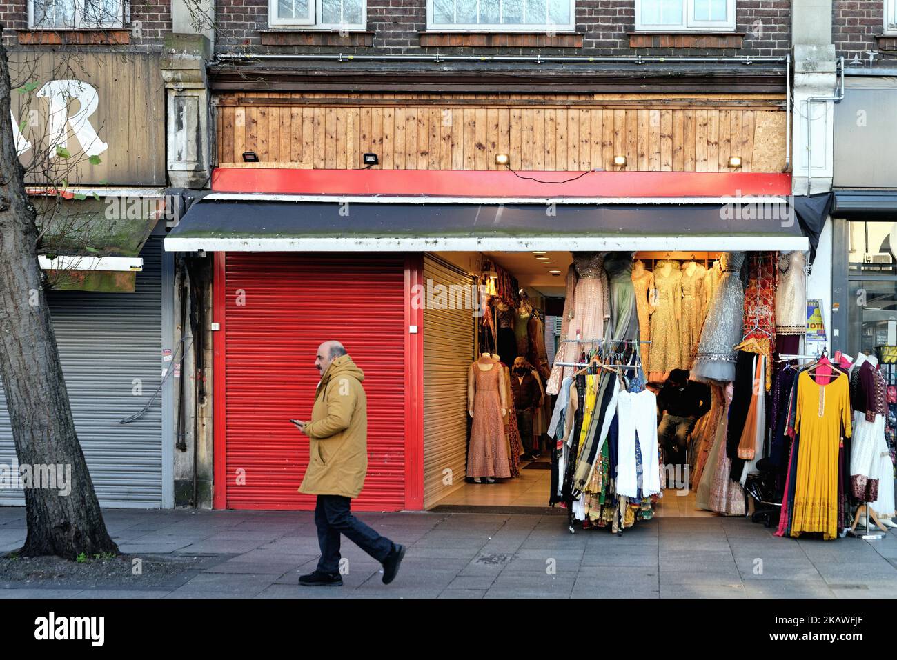 Colourful multicultural shop fronts in Southall Greater London England ...