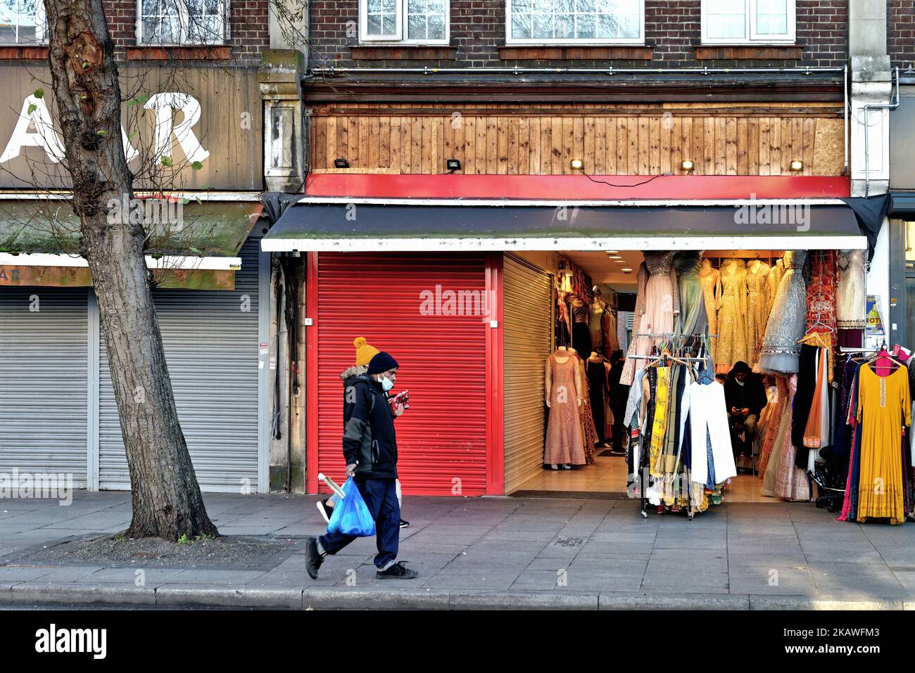 Colourful multicultural shop fronts in Southall Greater London England ...