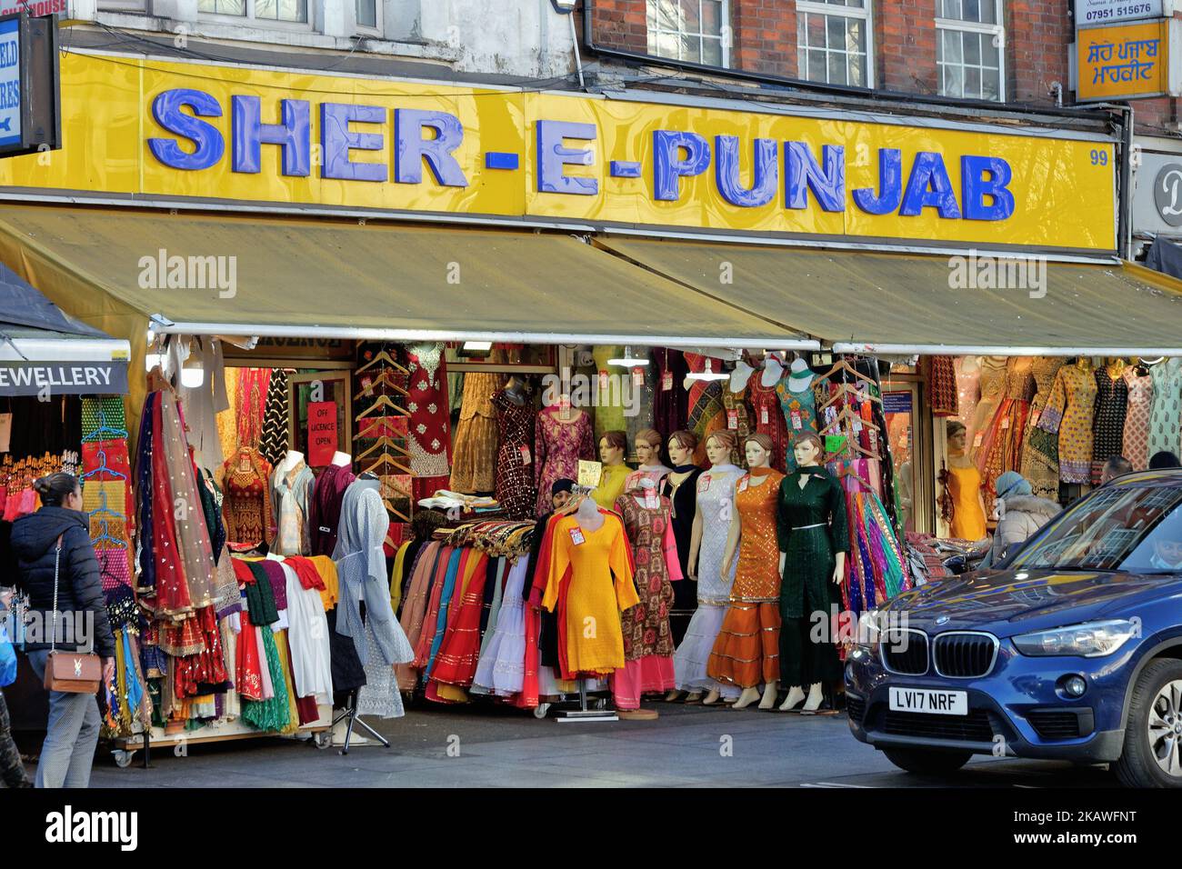 Colourful multicultural shop front in Southall Greater London England ...