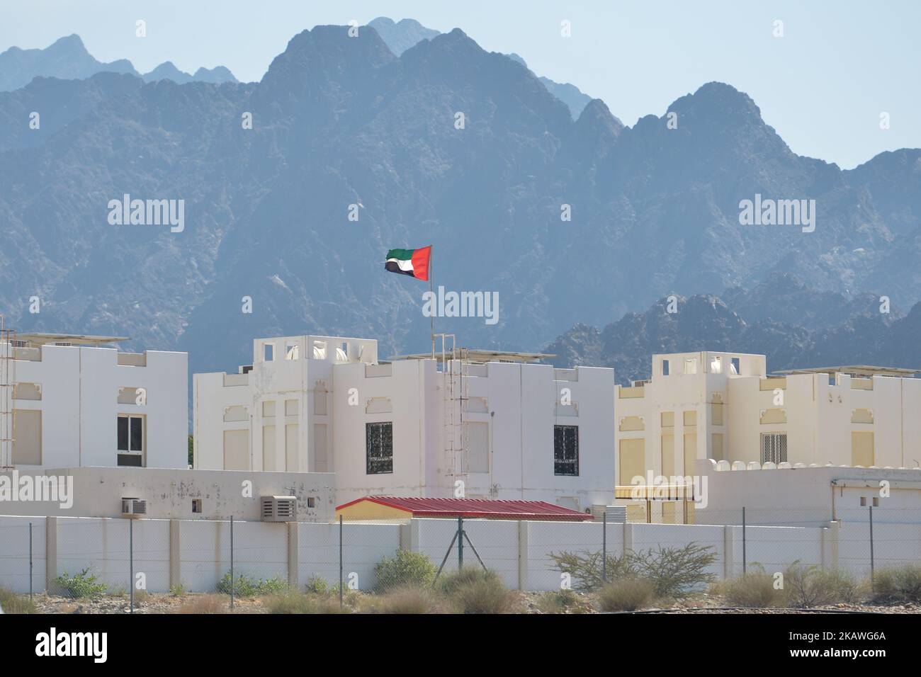 A view of typical architecture in Hatta with Al Hajar Mountains in the ...