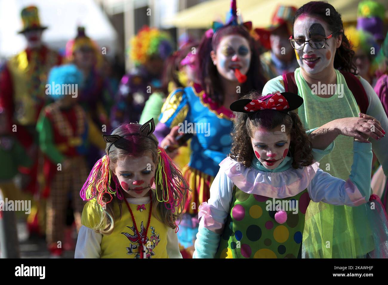 People dressed as clowns take part on the Carnival Clown's Parade at ...