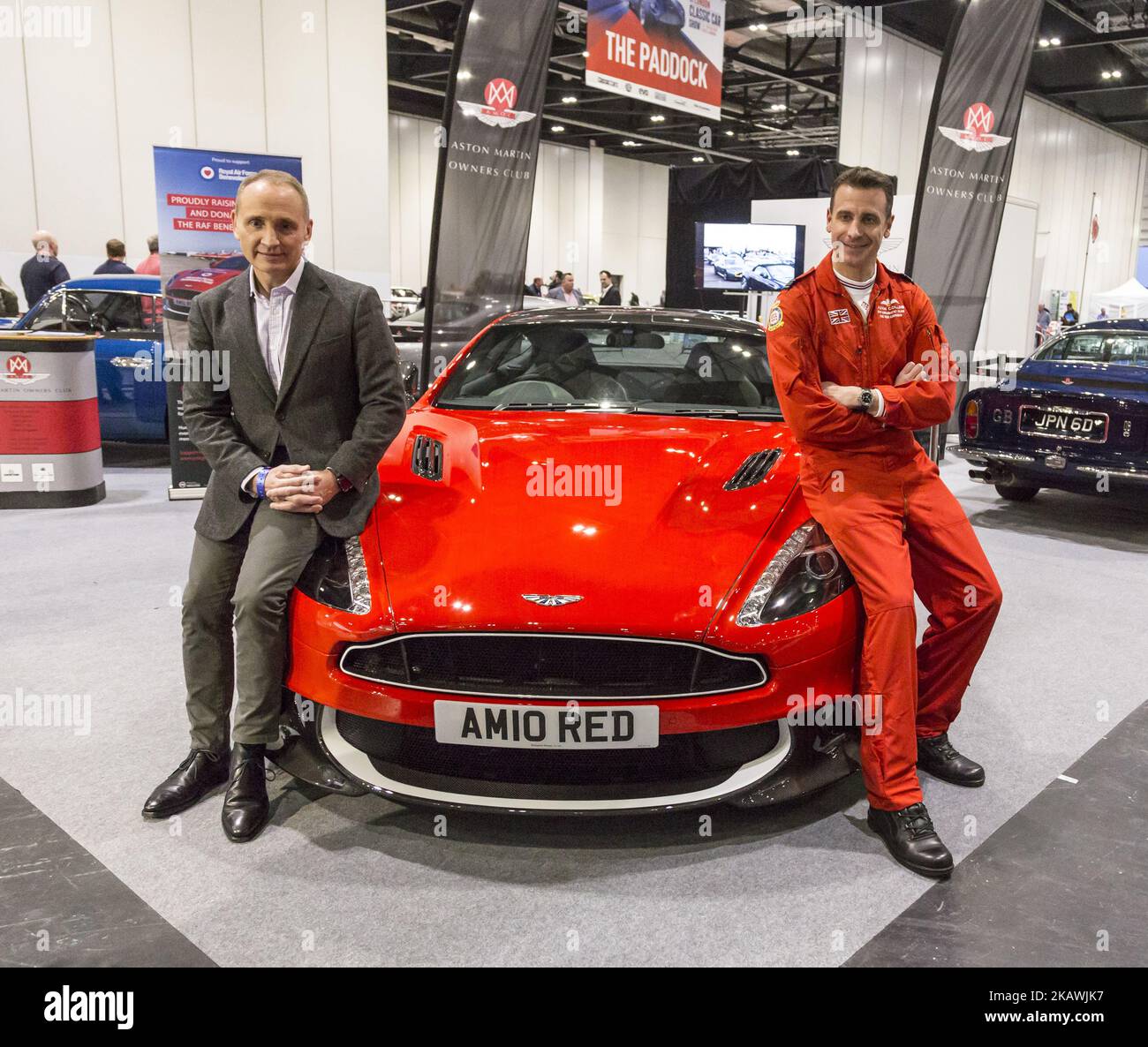 RAF Red Arrows Squadron Leader Adam Collins (right) and a man who won ...