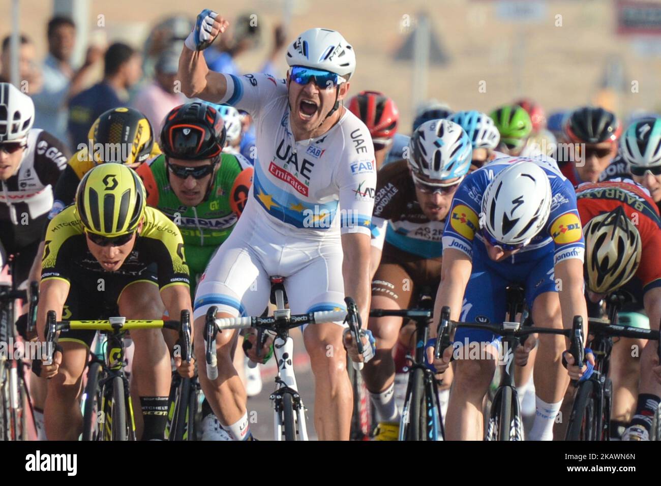 Norway's Alexander Kristoff (center) from UAE Team Emirates wins the ...