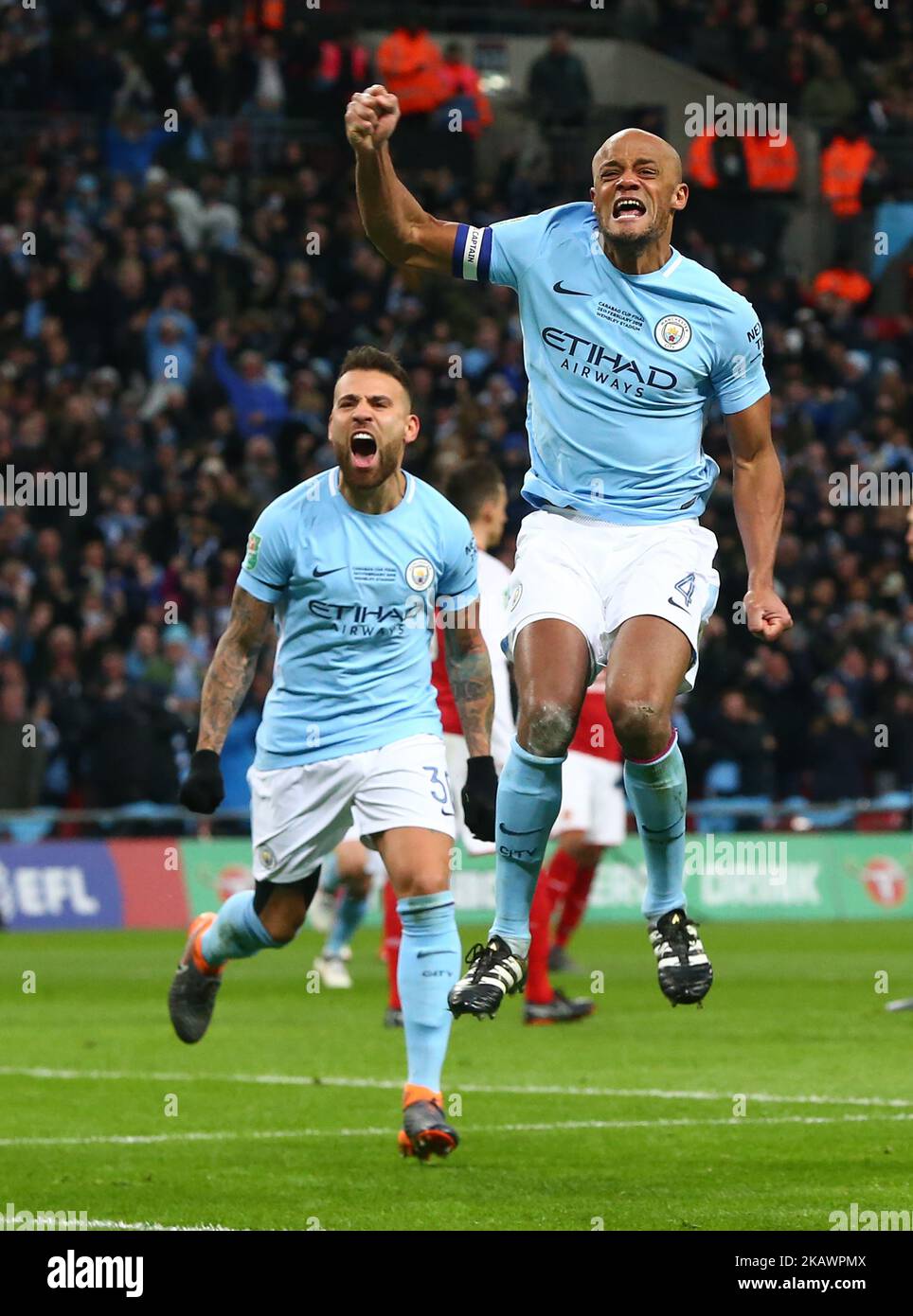 Manchester City's Vincent Kompany celebrates scoring his sides second ...
