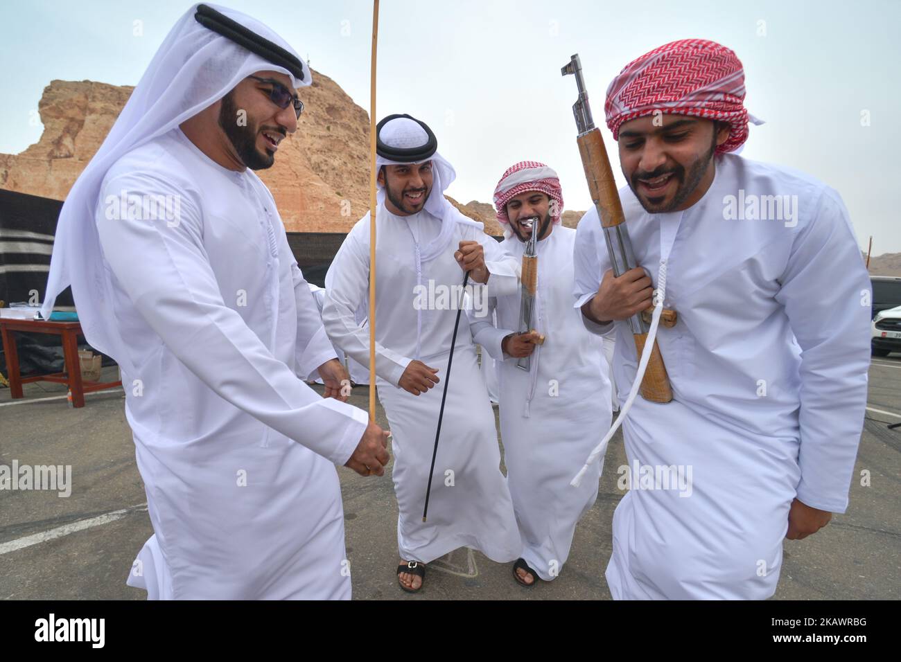 A group of local men perform the 'stick dance', a traditional ...