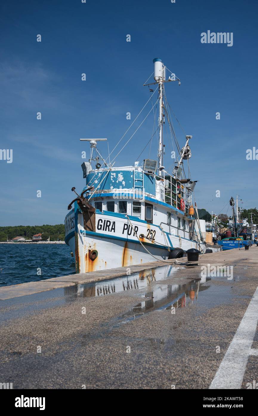 A fishing boat in the port of Rovinj, Croatia Stock Photo - Alamy