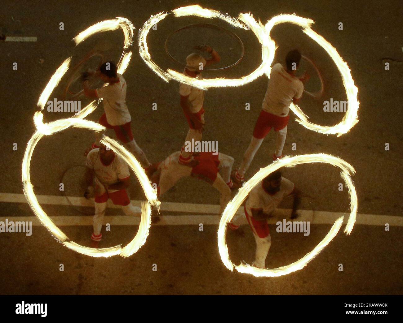 Sri Lankan fire dancers perform during the Navam perahera, the Annual ...