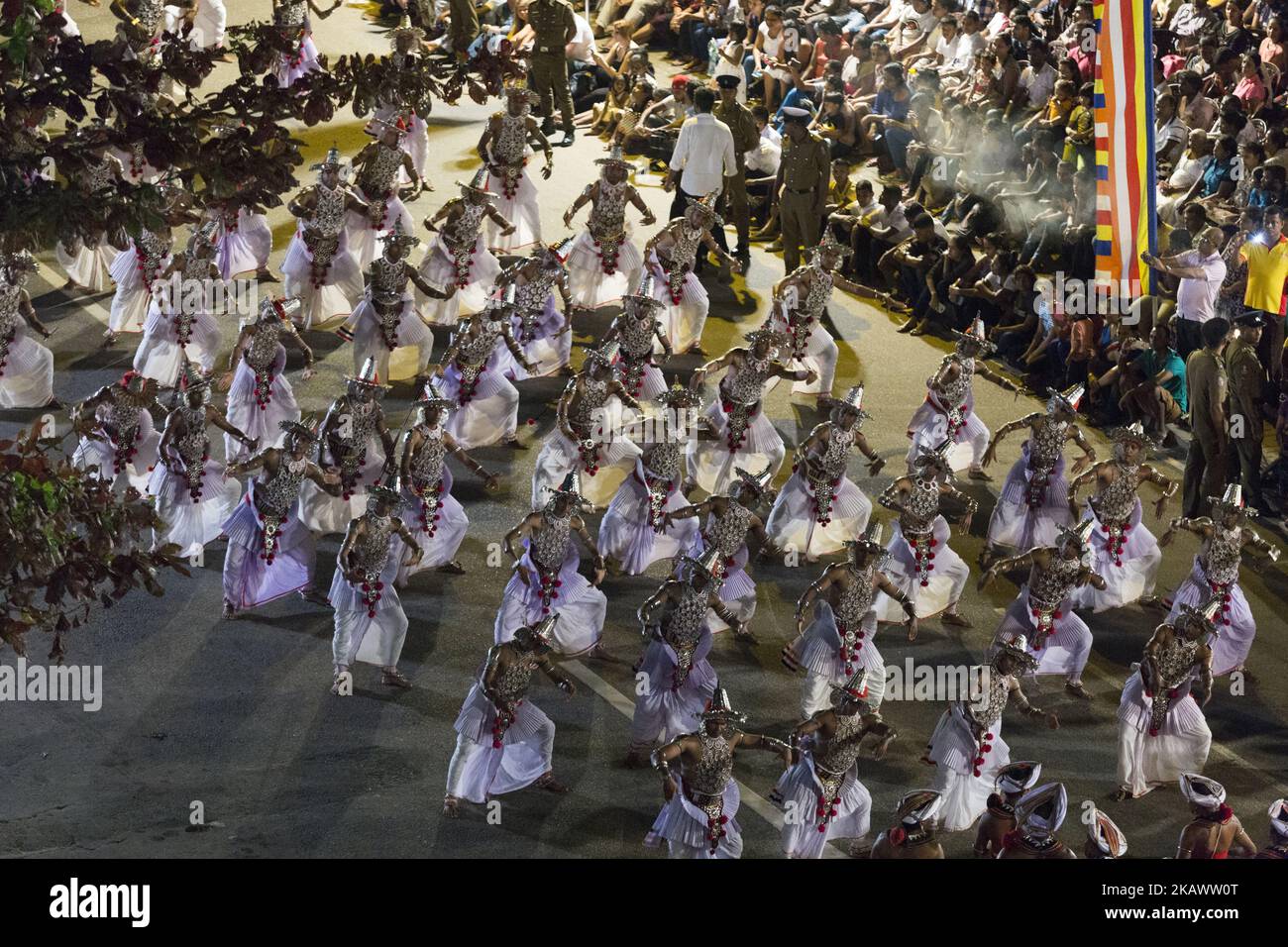 Sri Lankan traditional dancers perform during the Navam perahera, the ...