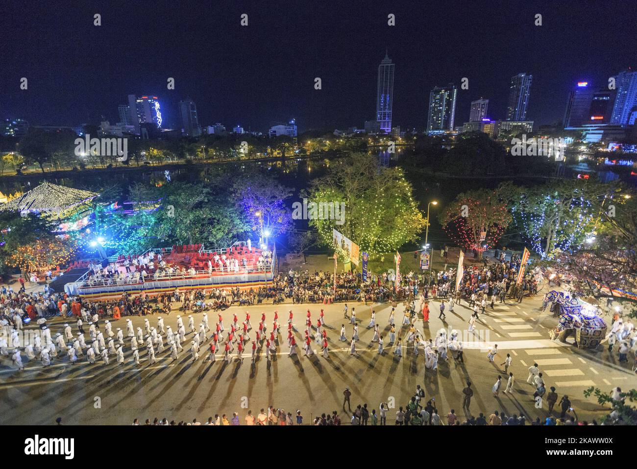 The sacred Buddhist relic casket is carried out by an elephant led by ...