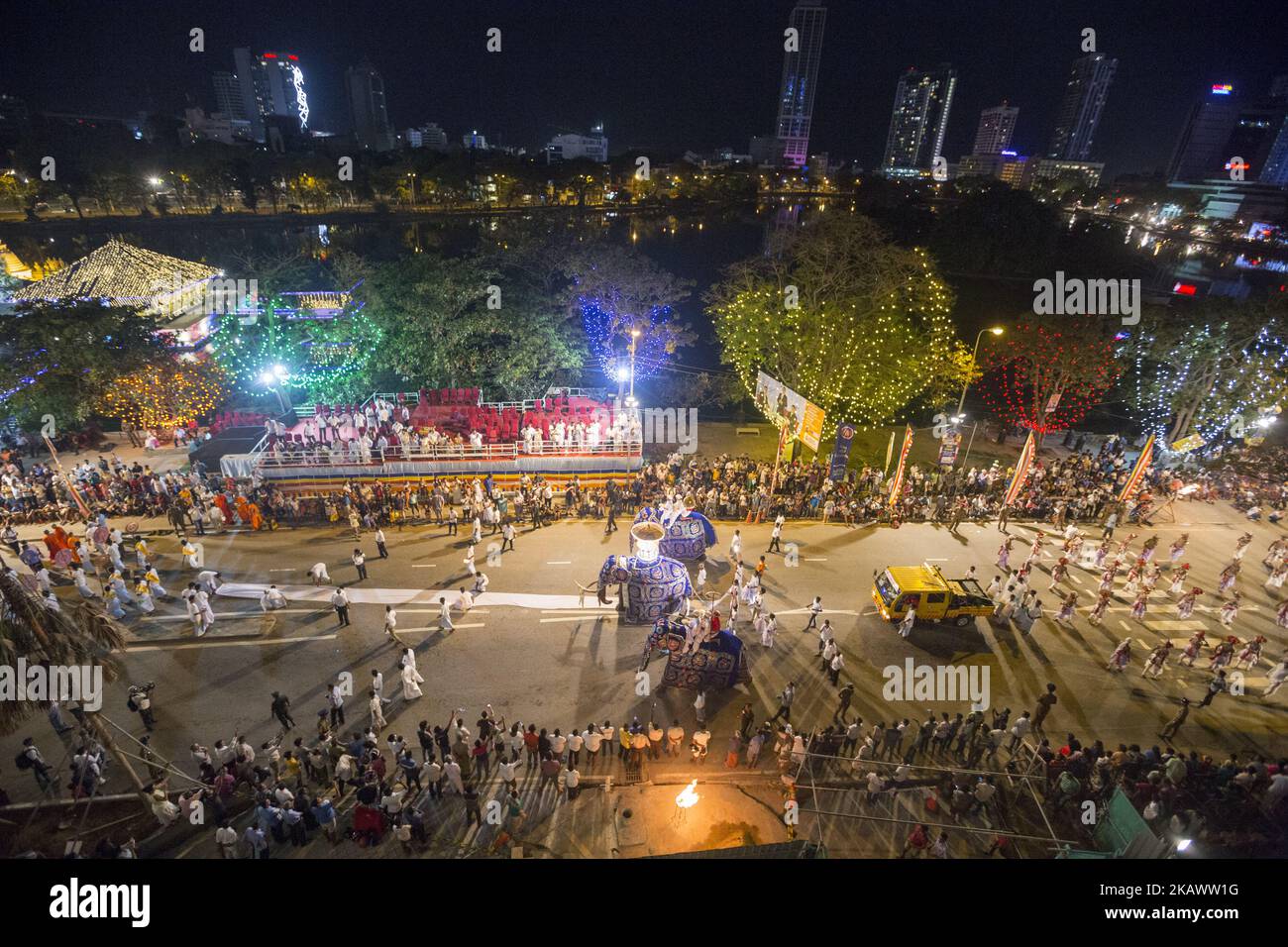 The sacred Buddhist relic casket is carried out by an elephant led by ...