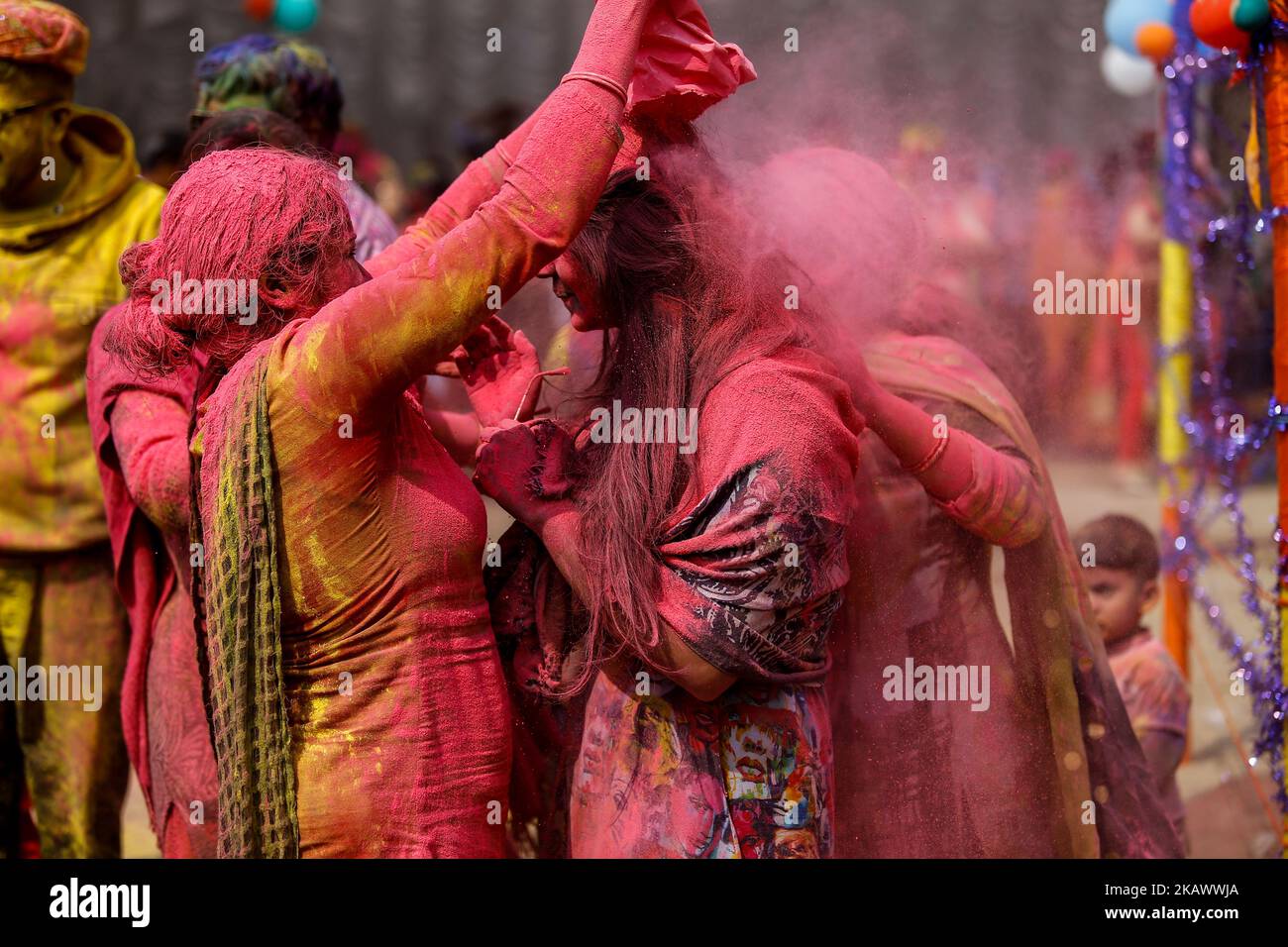 Nepalese play with colour powder as they celebrate Holi festival in ...