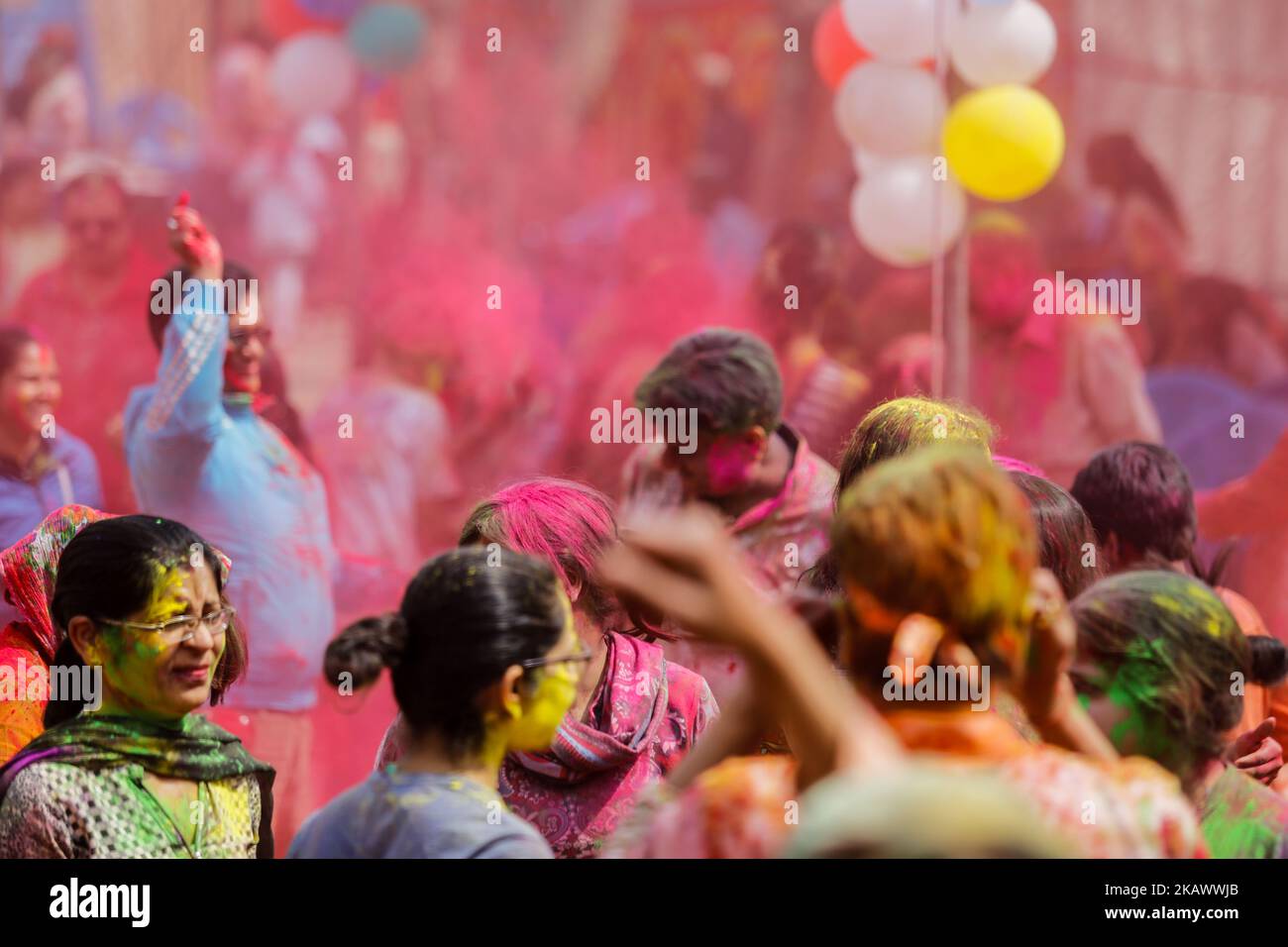 Nepalese play with colour powder as they celebrate Holi festival in ...