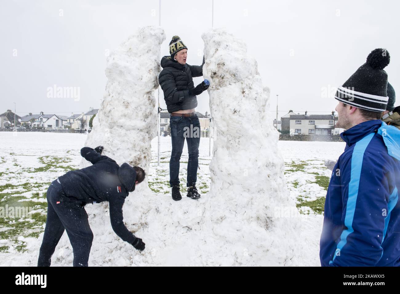 Men are building a snow gate at The south park in galway which was ...