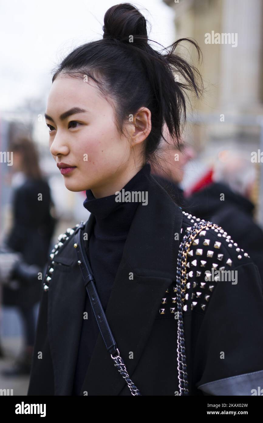 He Cong attends the Chanel show as part of the Paris Fashion Week ...
