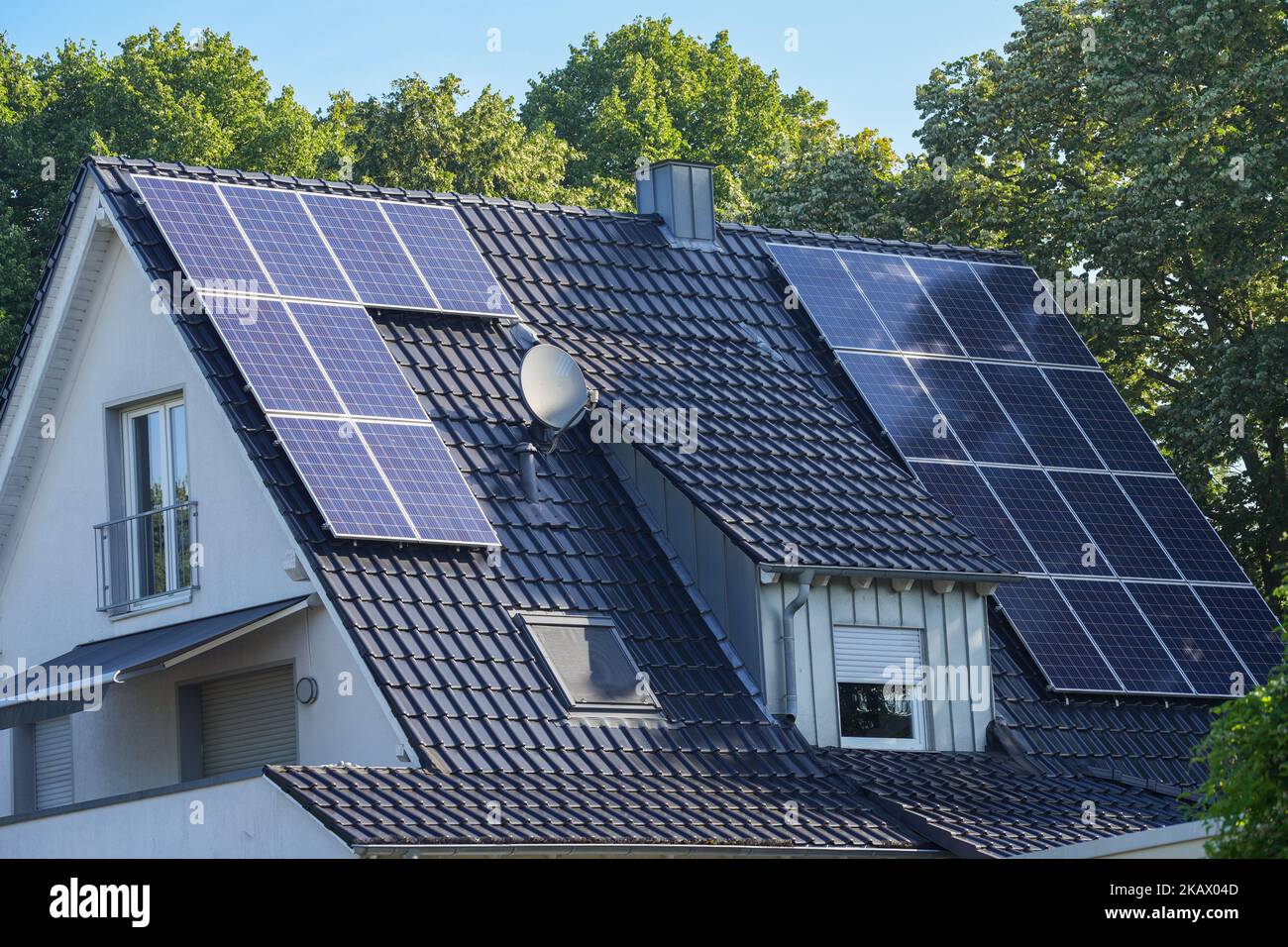 The view of a residential building with solar panels on its roof Stock ...
