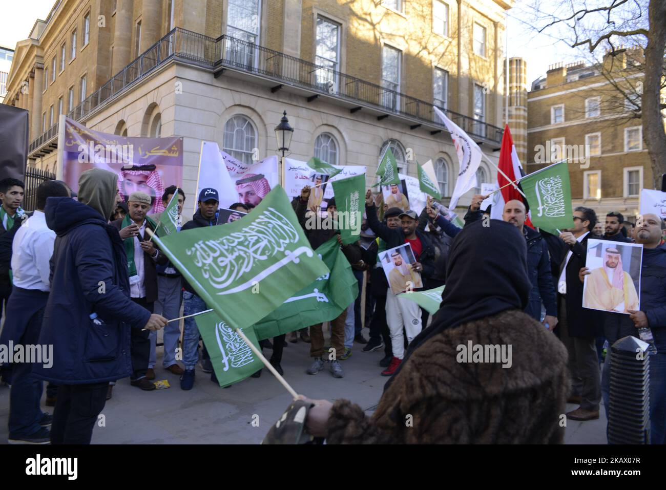 Demonstrators welcome Saudi Crown Prince, Mohammed bin Salman, as he ...
