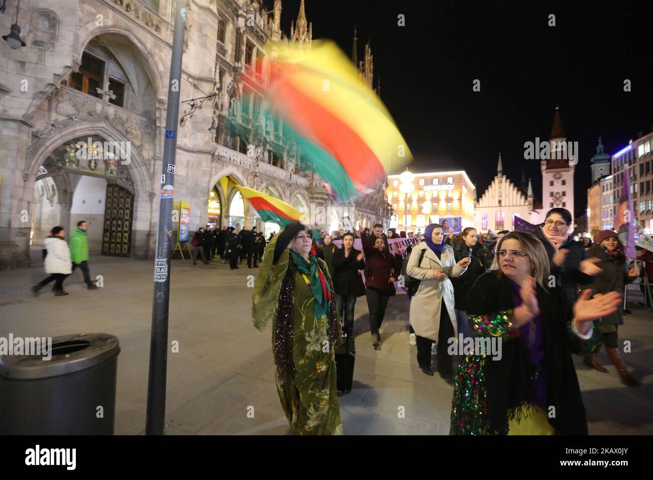 Kurdish activist waving a flag of Rojava. Some 400-500 people joined ...