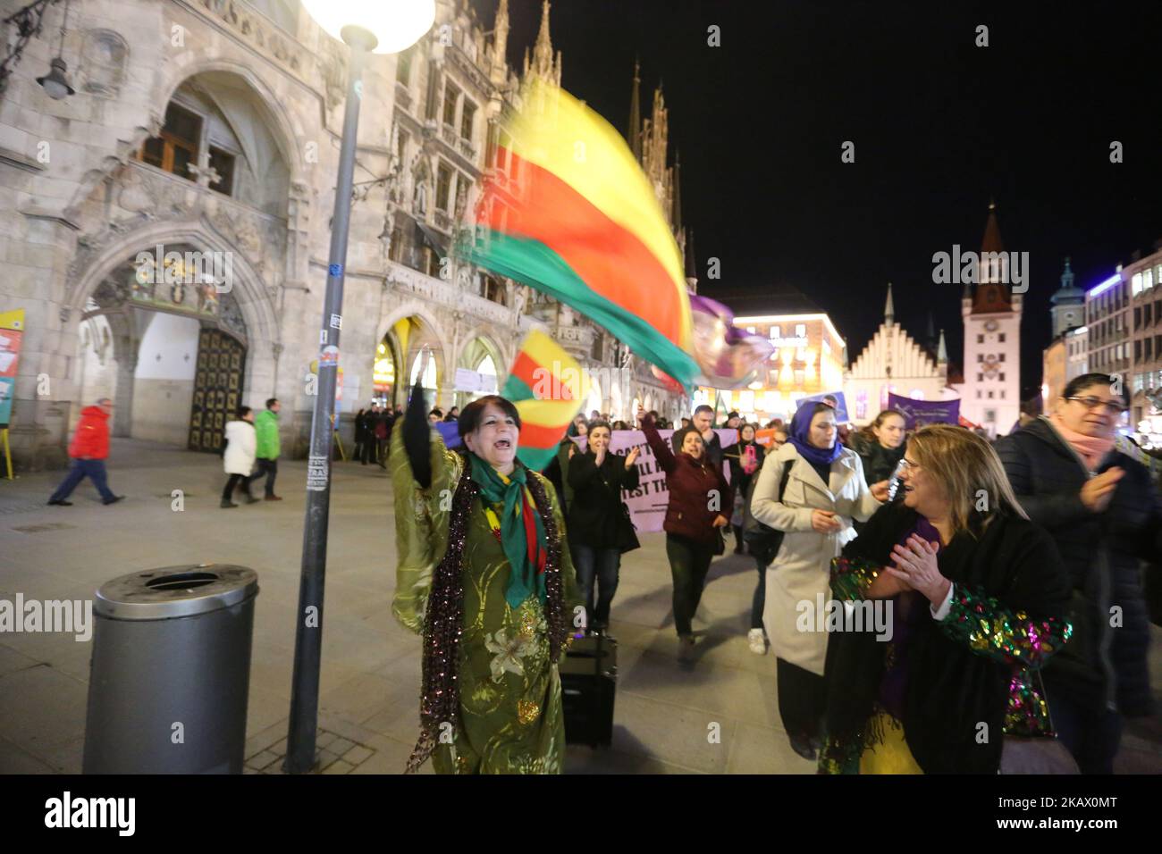 Kurdish activist waving a flag of Rojava. Some 400-500 people joined ...