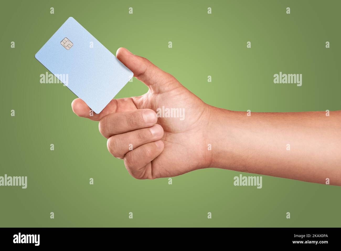 Man's hand holding credit card Stock Photo - Alamy