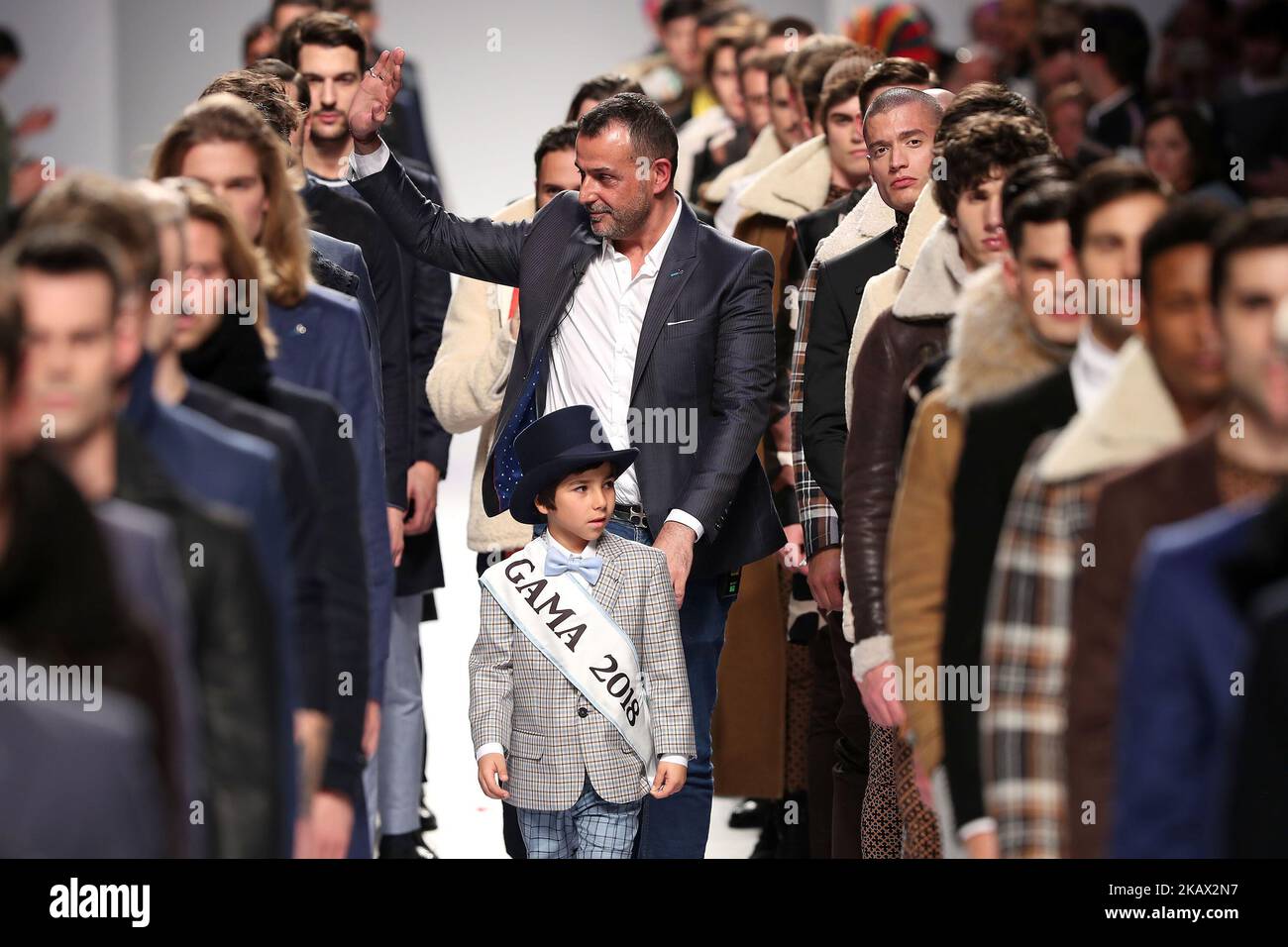 Portuguese fashion designer Nuno Gama acknowledges cheers after ...