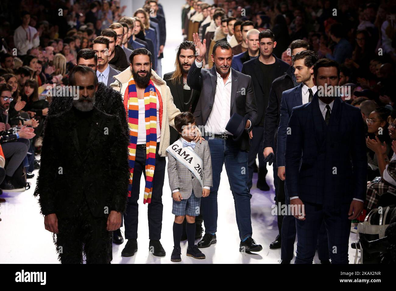 Portuguese fashion designer Nuno Gama acknowledges cheers after ...