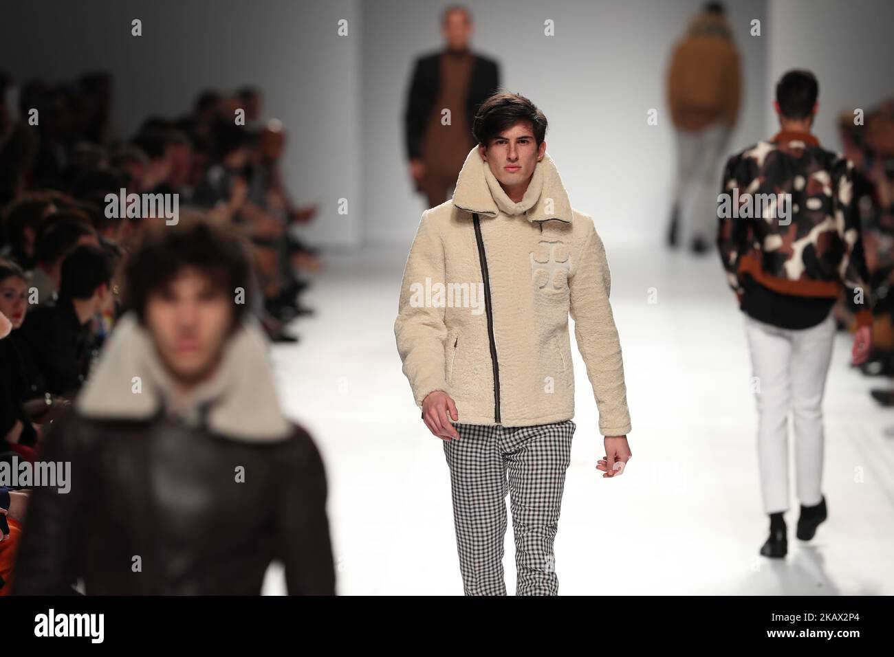 Models present creations from the Portuguese fashion designer Nuno Gama ...