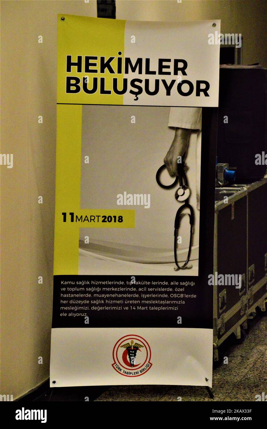 A banner reading 'Doctors are meeting' is seen as Turkish doctors and ...